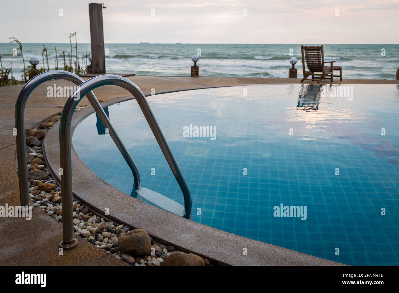 swiming pool with blue water background Stock Photo - Alamy