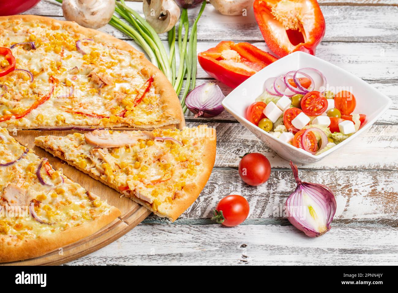 Pizza with chicken, paprika and corn. Italian kitchen and cooking ...