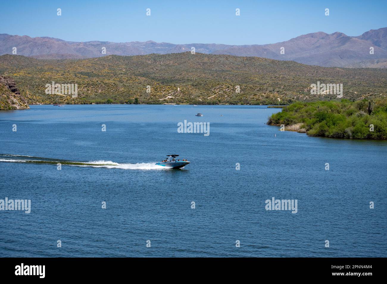 Speed boat cruising on lake front hi-res stock photography and images ...