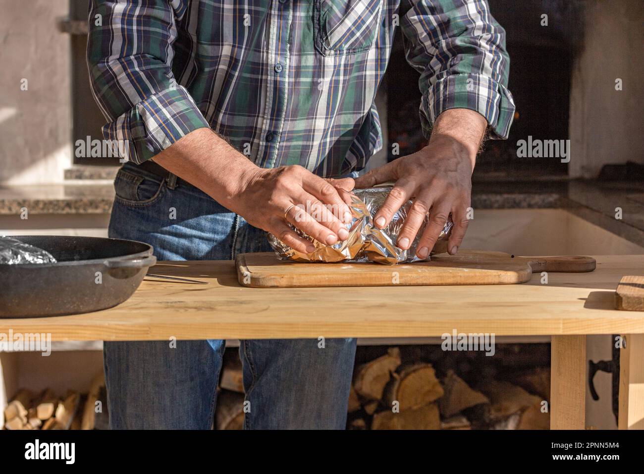 The process of cooking meat. Home Cooking Recipes Stock Photo - Alamy
