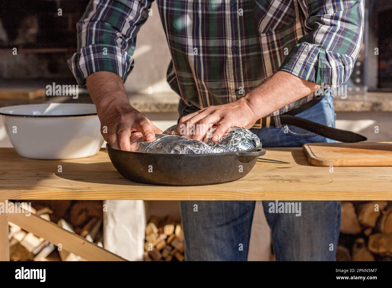 The process of cooking meat. Home Cooking Recipes Stock Photo - Alamy