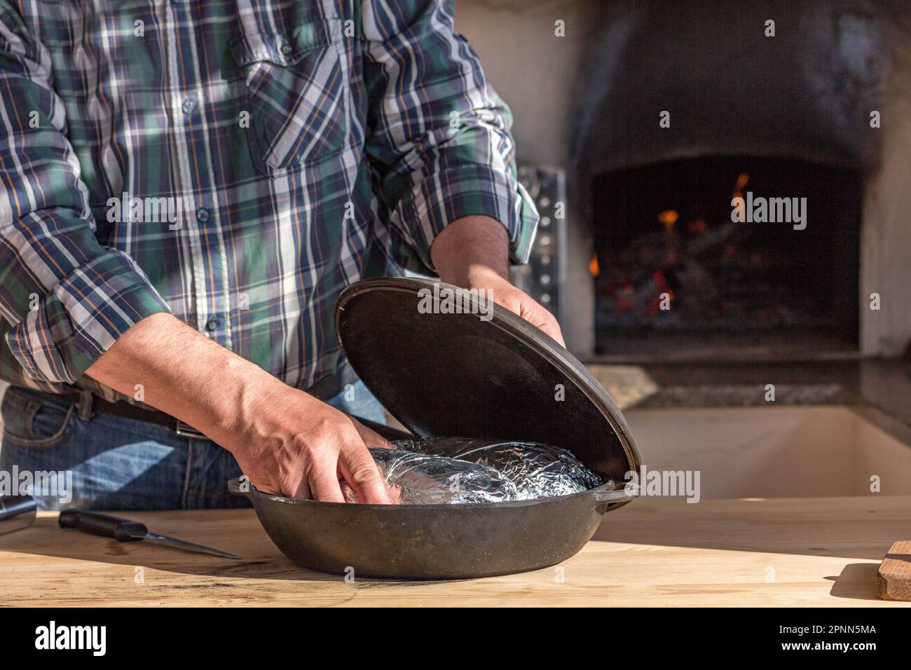 The process of cooking meat. Home Cooking Recipes Stock Photo - Alamy