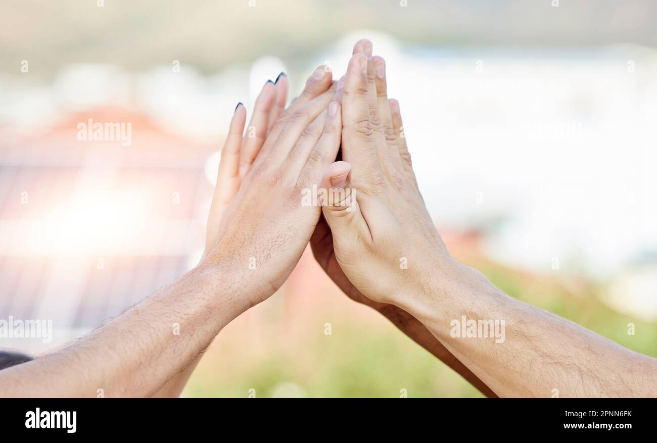 People, group and high five hands for support, solidarity and teamwork ...