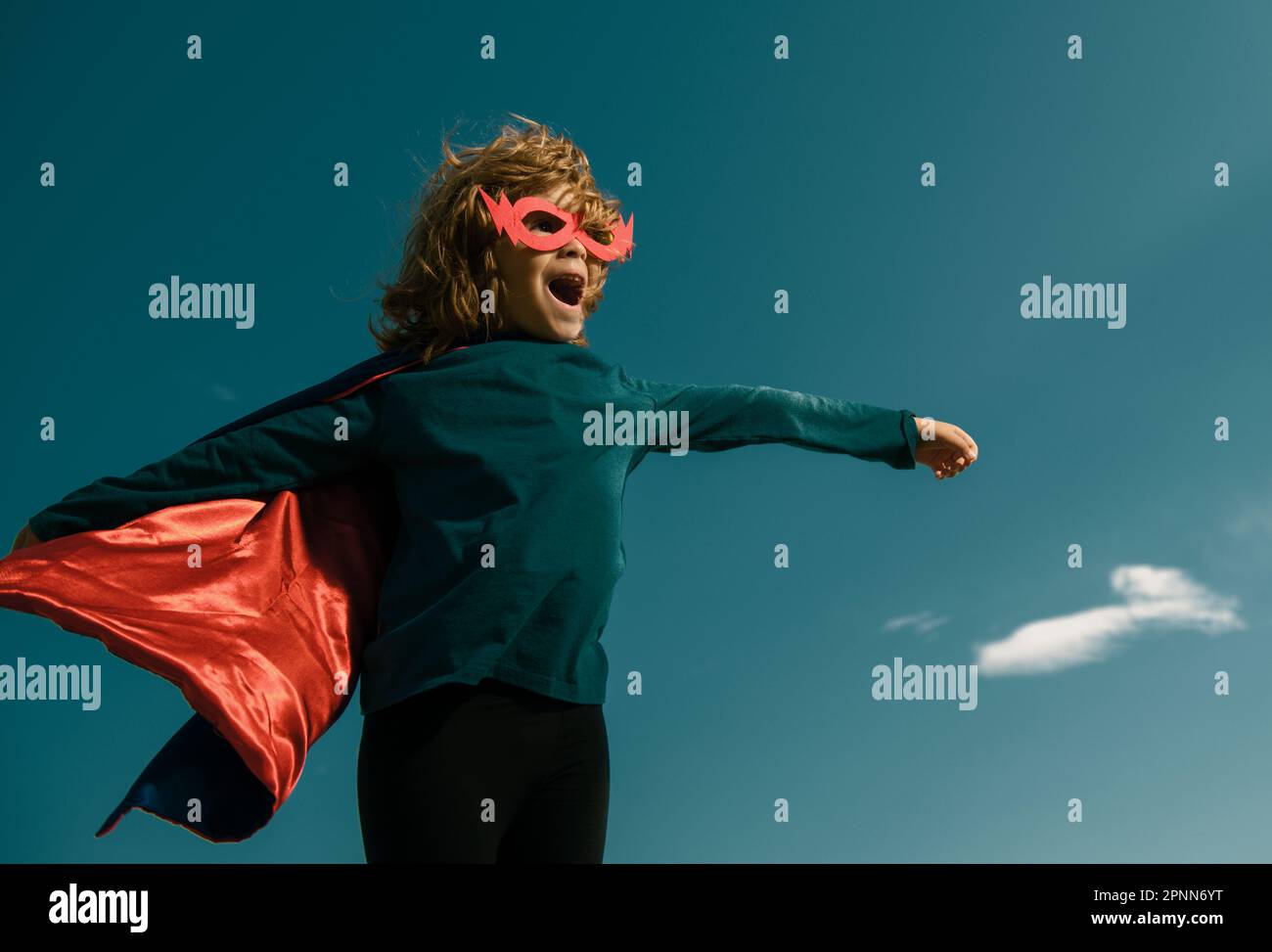Excited child boy dressed like superhero. Super hero concept Stock ...