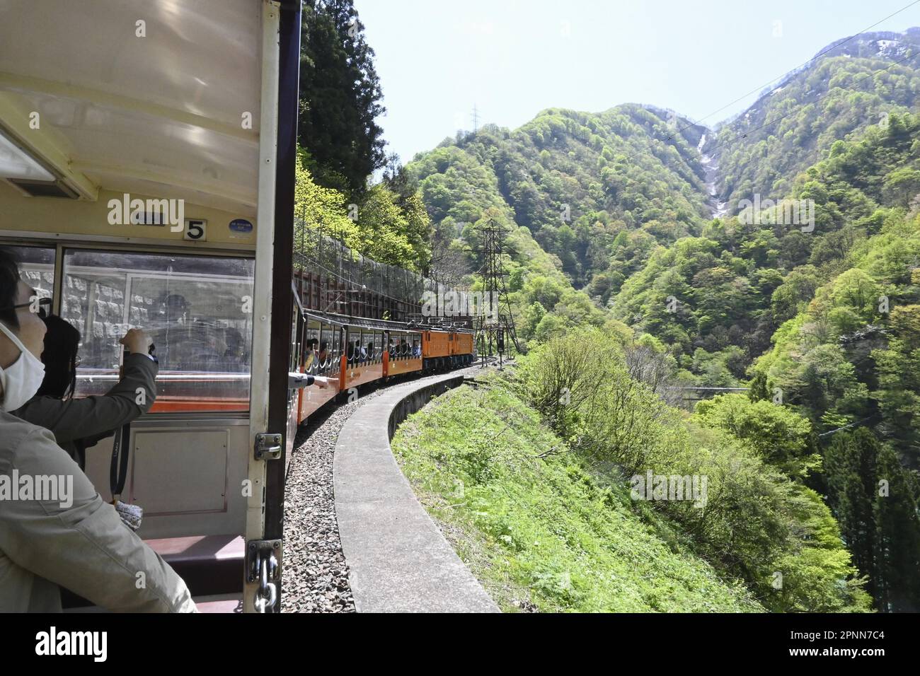Kurobe Gorge Railway Co.'s "torokko" train offers passengers scenic ...