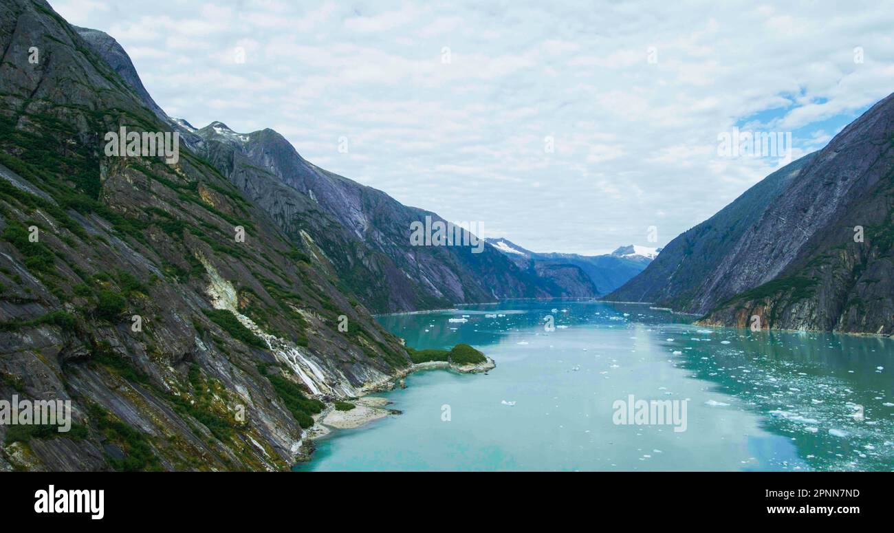 Rocks, melting ice, glaciers, rivers, forests and mountains seen from ...