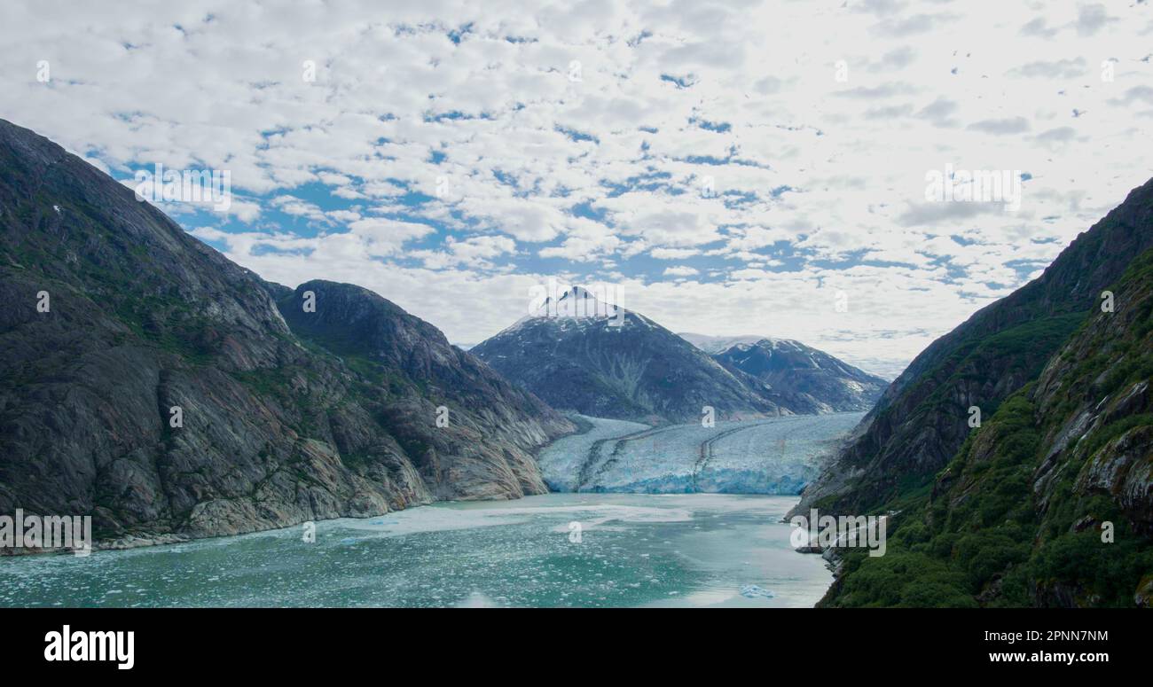 Rocks, melting ice, glaciers, rivers, forests and mountains seen from ...