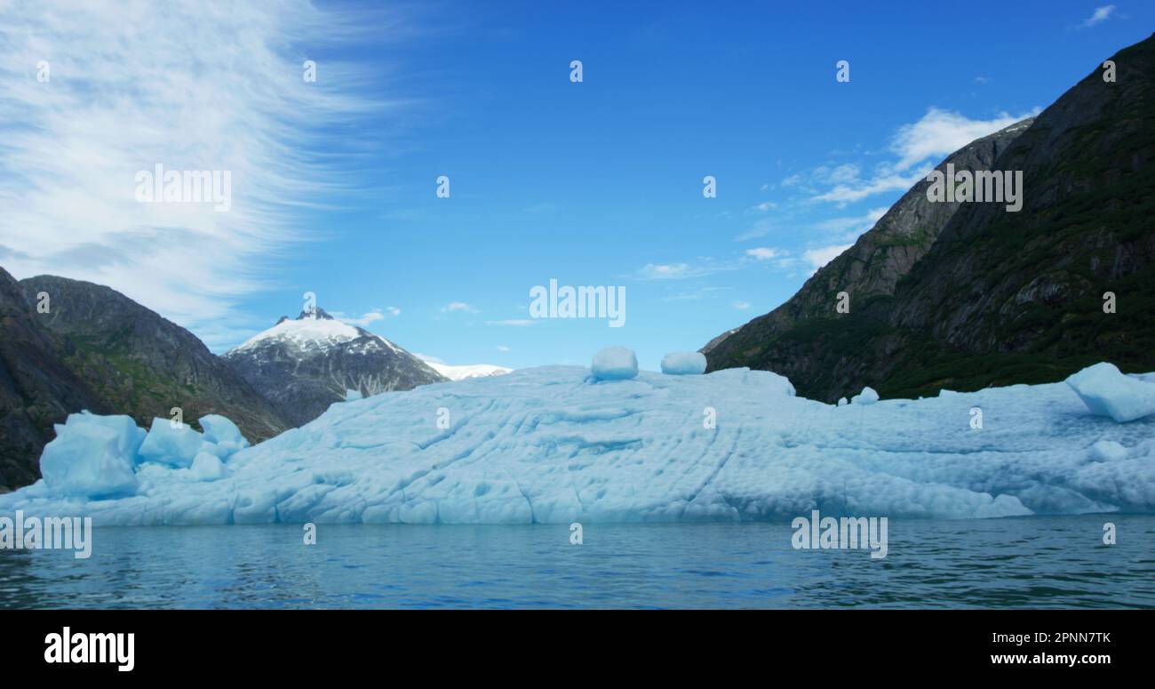 Watch the ice floes and icebergs on the river in a small boat. Rocks ...