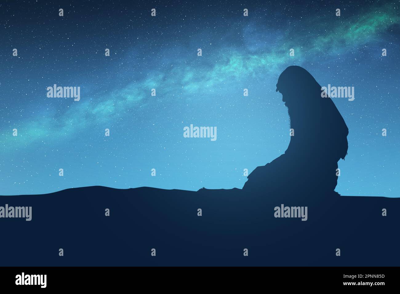 Silhouette of a Muslim man with a beard wearing keffiyeh with agal in a ...