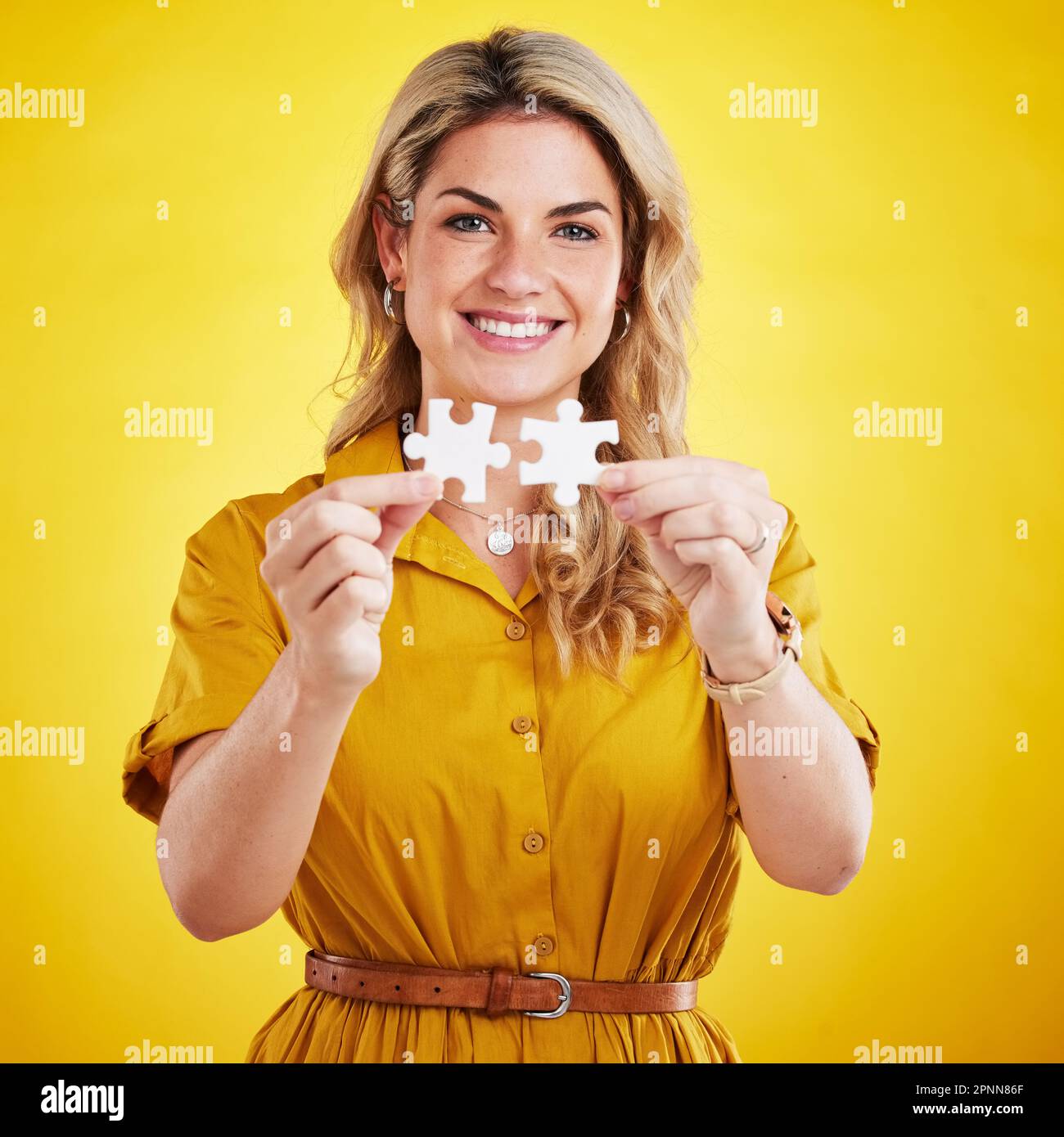 Portrait, puzzle and woman in studio for problem solving, solution and ...