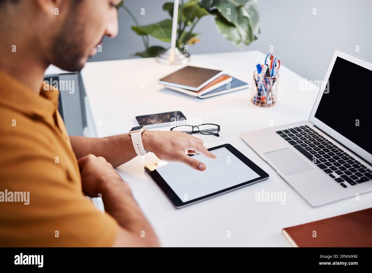 Office tablet, mockup and man typing url search on advertising copy ...