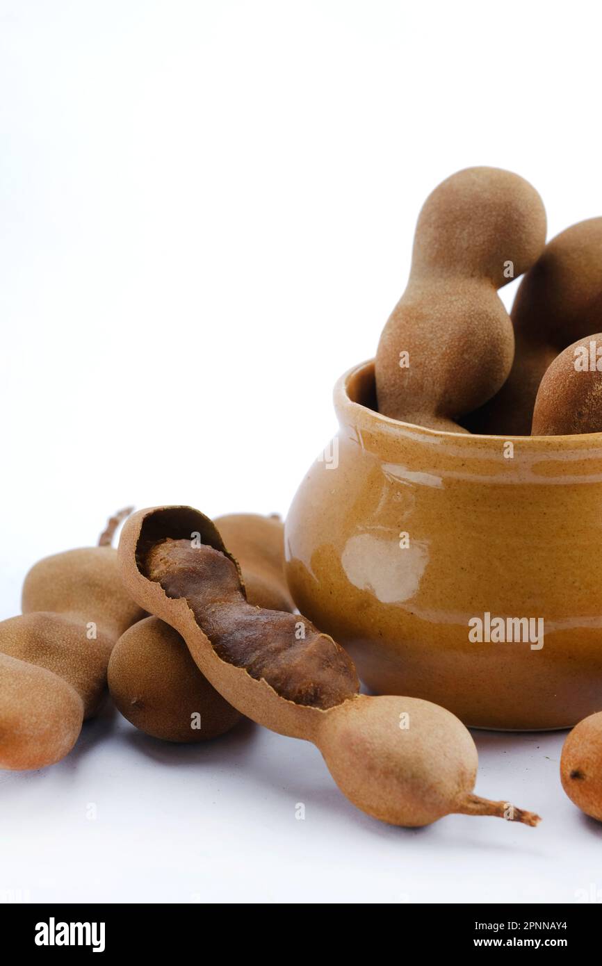 fresh Delicious ripe tamarinds, tamarind with brown pulp with green ...