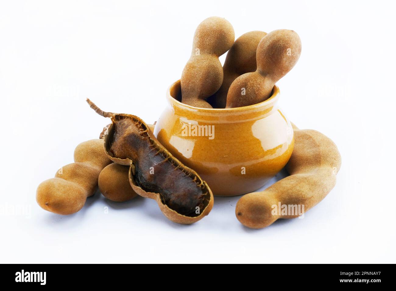 fresh Delicious ripe tamarinds, tamarind with brown pulp with green ...