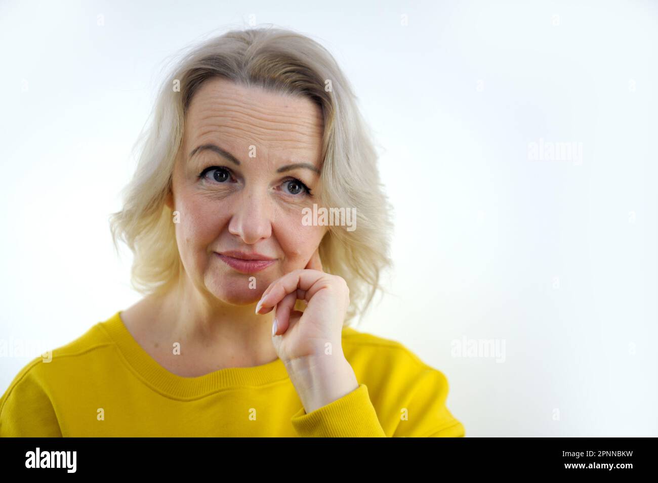 Closeup photo of amazing short hairdo lady looking up empty space deep ...