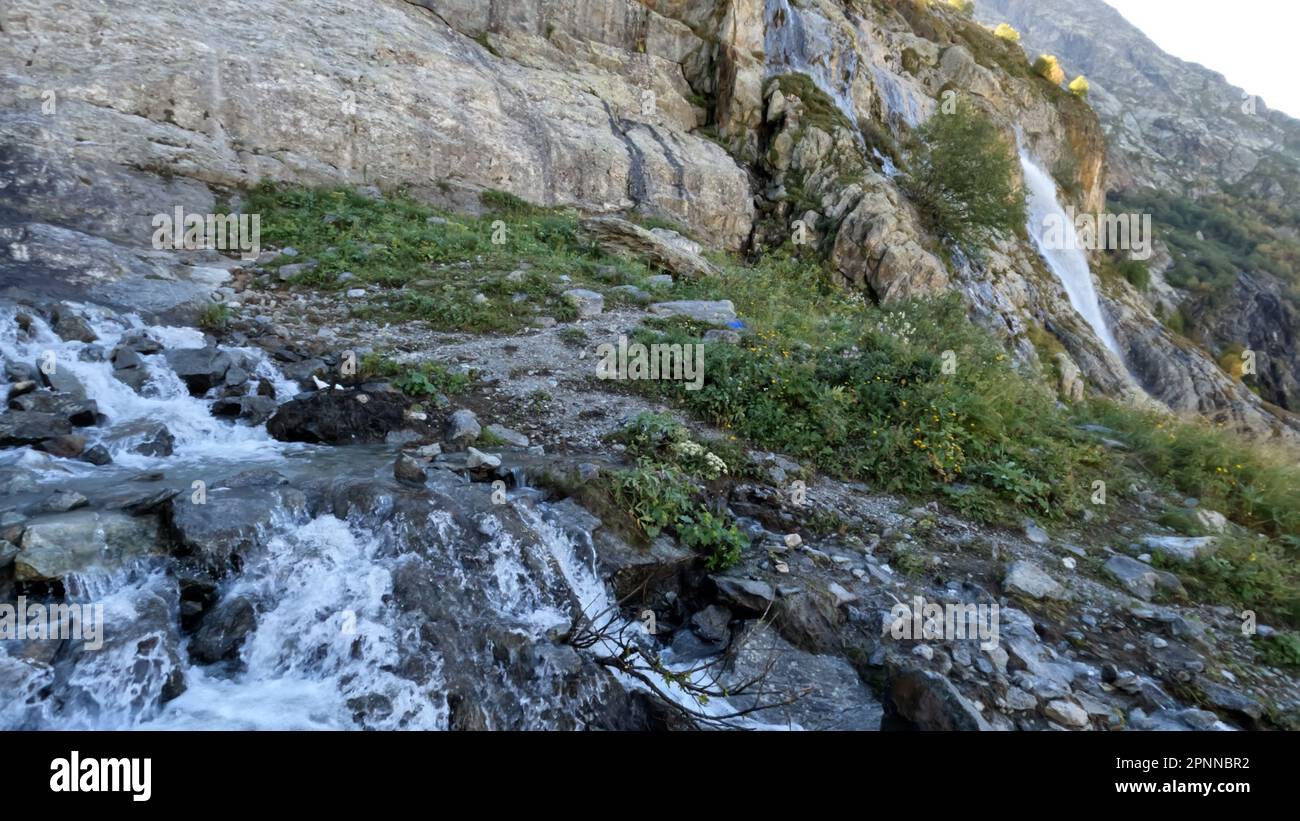 pretty mountain high land fast water cascade at summertime day - photo ...
