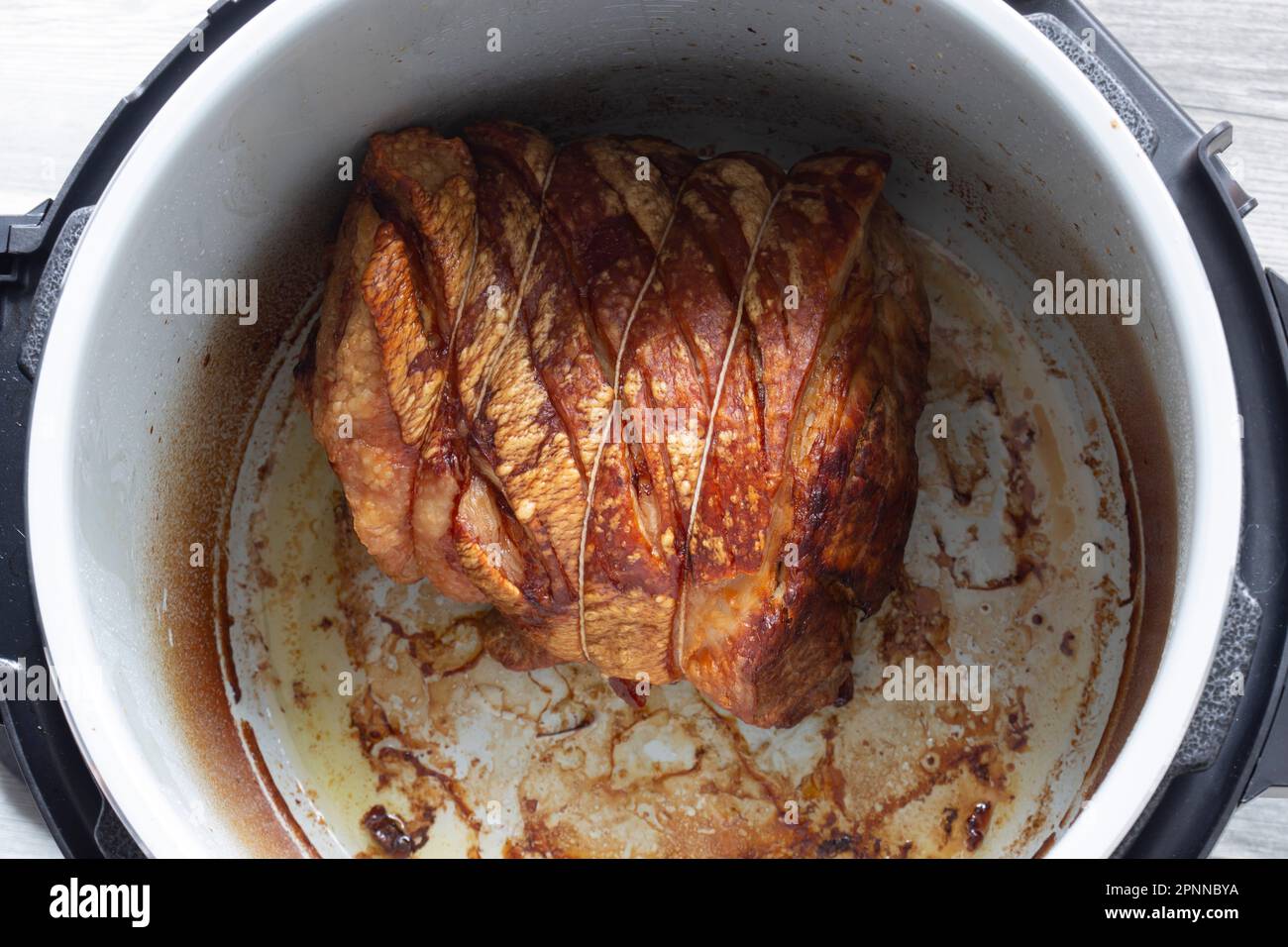 Pork shoulder joint of meat cooked in an air fryer. Healthy low cost ...