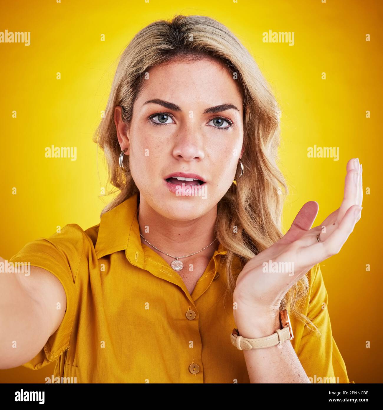 Selfie, shock and portrait with a woman on the background of a yellow ...