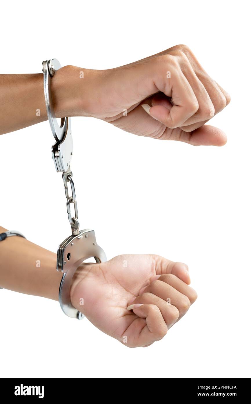 Arrested man with a handcuff on his hand isolated over white background ...