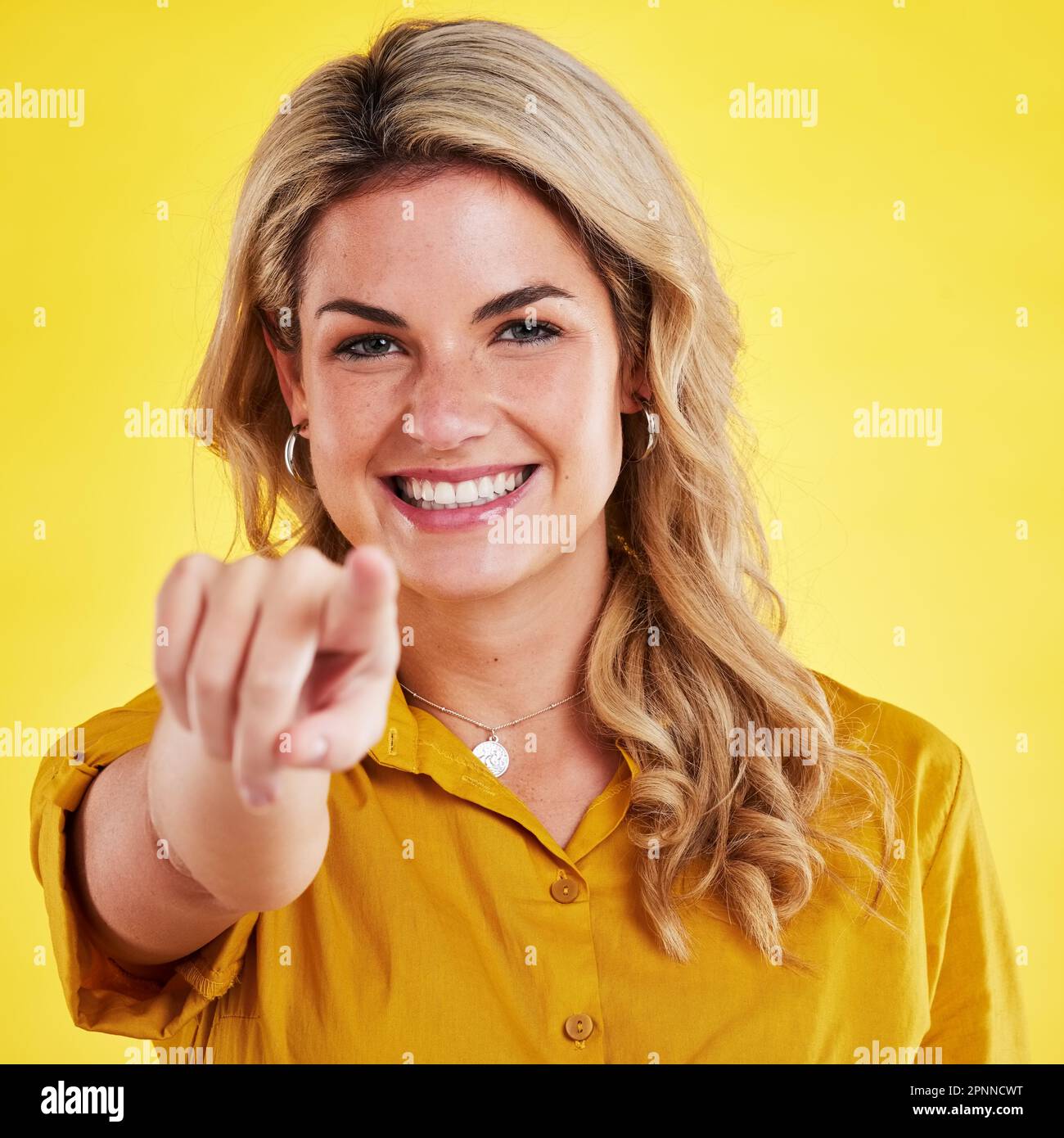 Recruitment, happy and portrait of a woman pointing finger isolated on ...