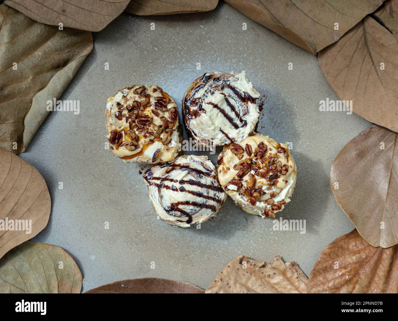 Two Soft Chocolate Buns topped with rich cream cheese frosting and Two ...