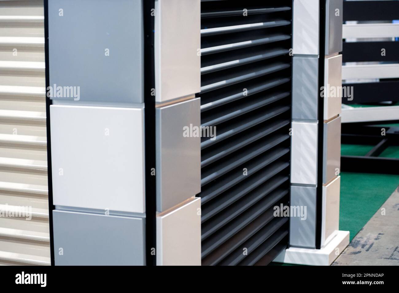 Metal fence shutters. Fencing element Stock Photo - Alamy