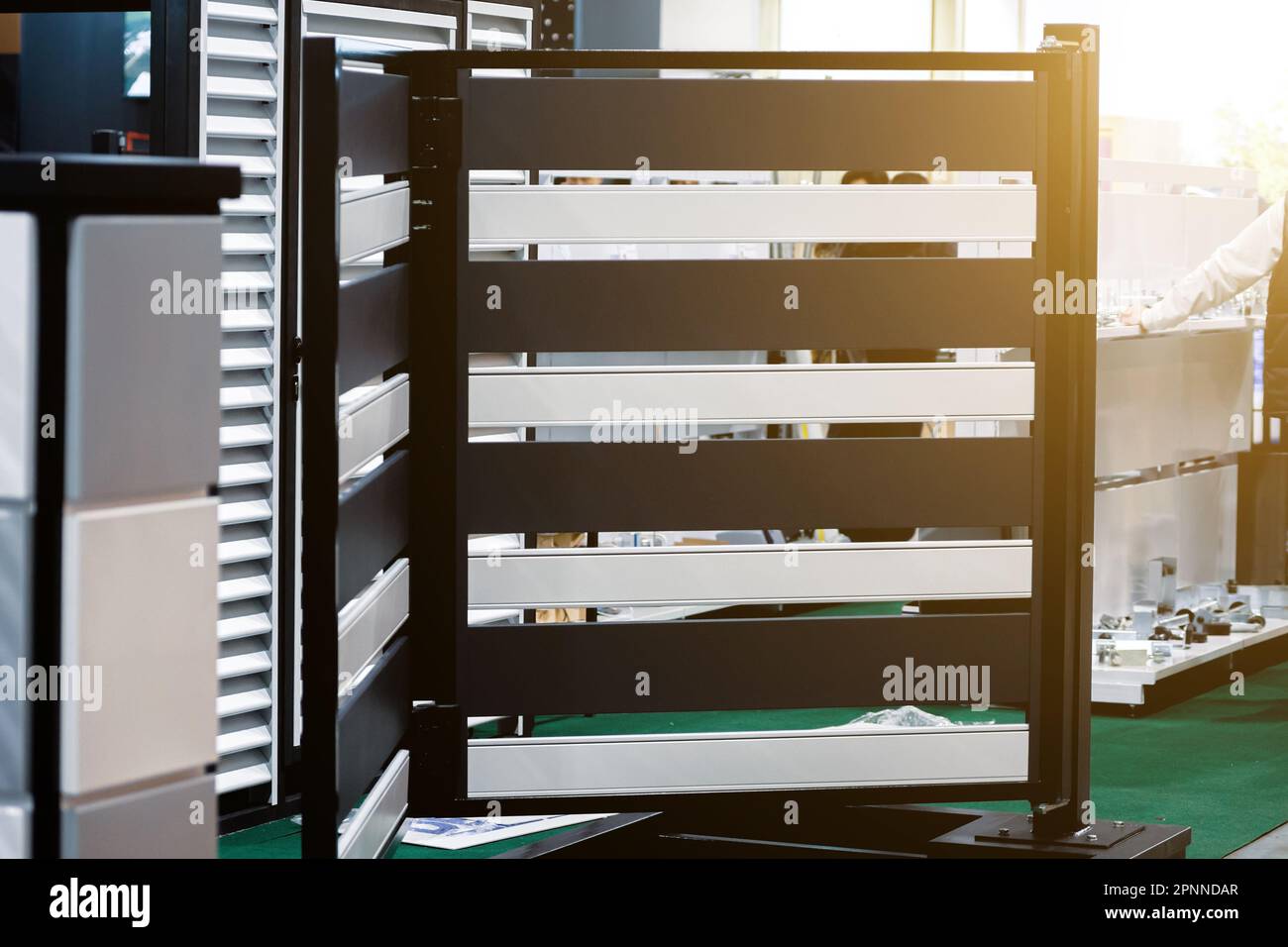 Metal fence shutters. Fencing element Stock Photo - Alamy