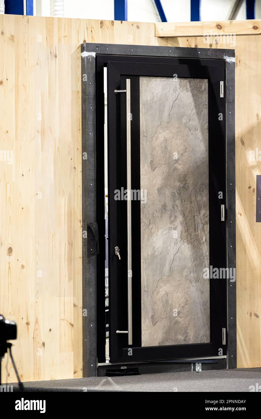 Entrance metal doors in a house under construction Stock Photo - Alamy