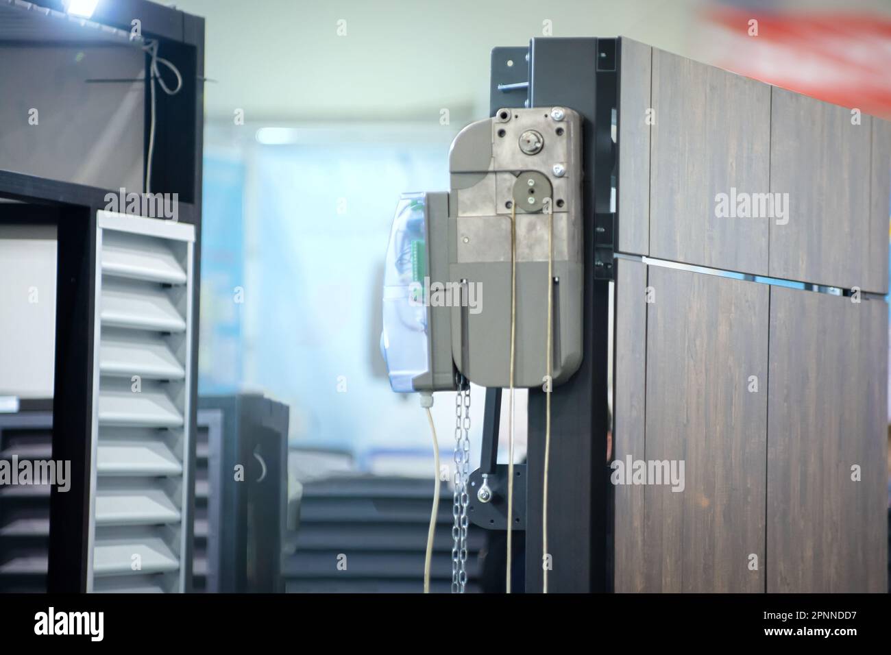 Electric drive of the garage entrance gate Stock Photo - Alamy