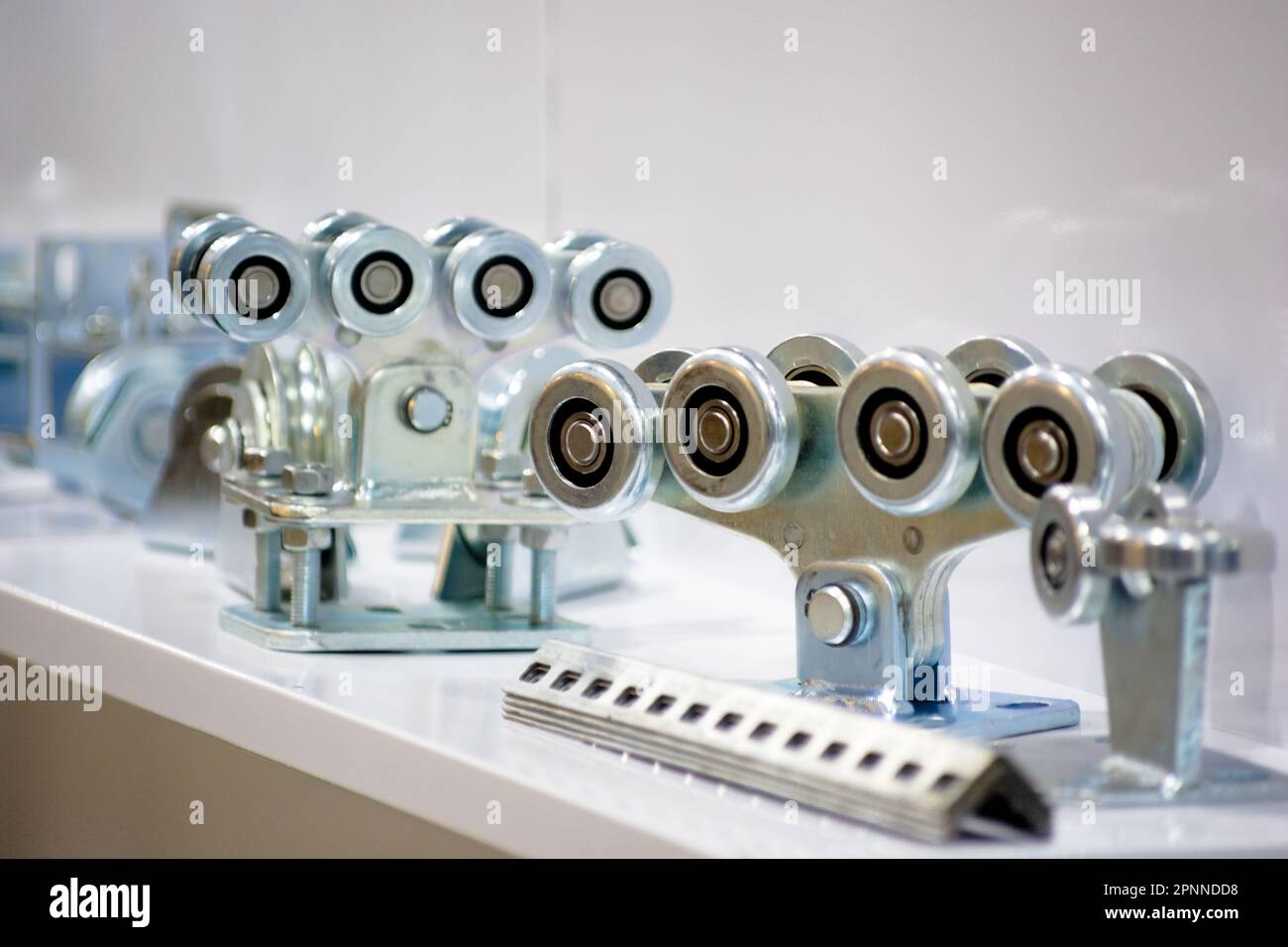 Carrier roller system for gates. Gate accessories Stock Photo - Alamy