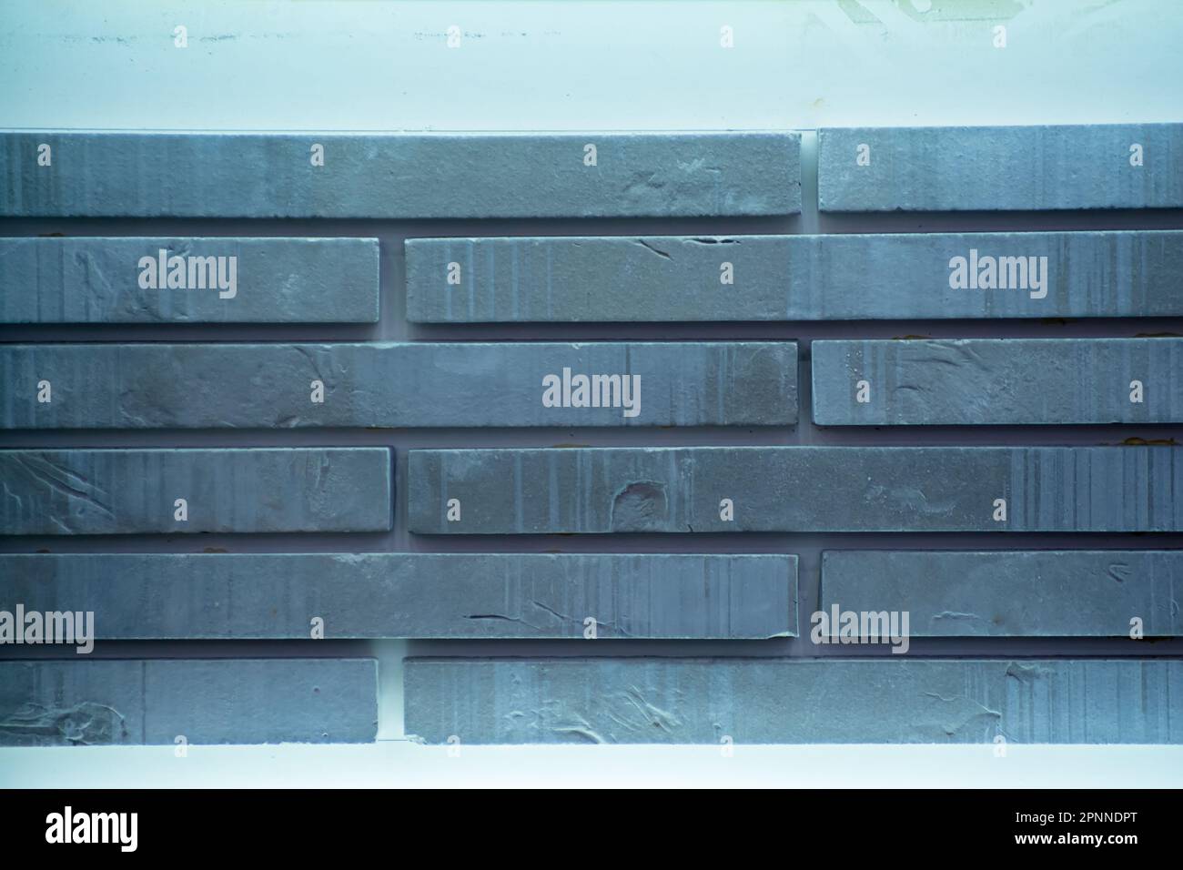 Fragment of gray brickwork. Neat brickwork Stock Photo - Alamy