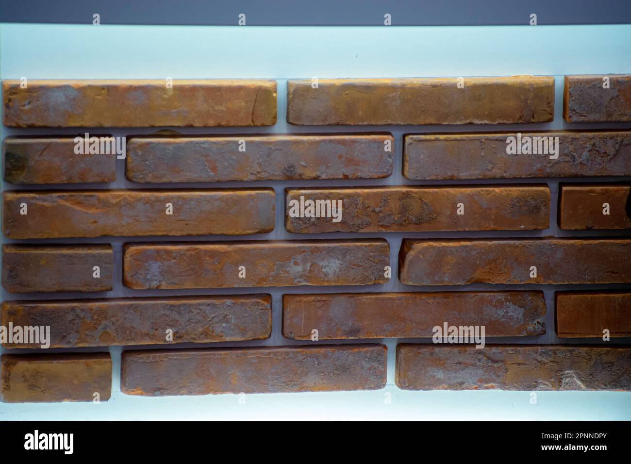 Fragment of dark red brickwork. Neat brickwork Stock Photo - Alamy