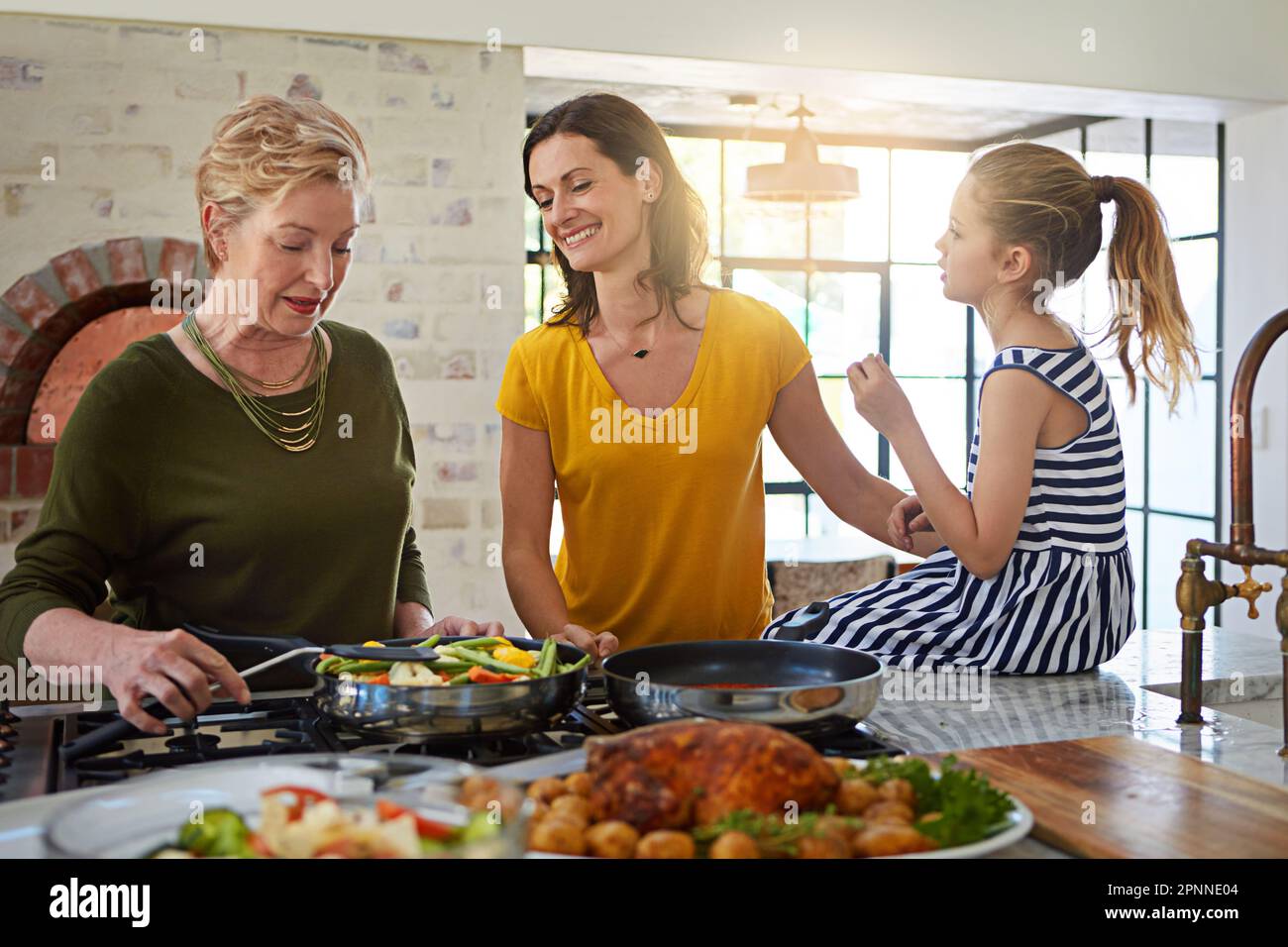 Making great tasting food with family is the best. a three generational ...