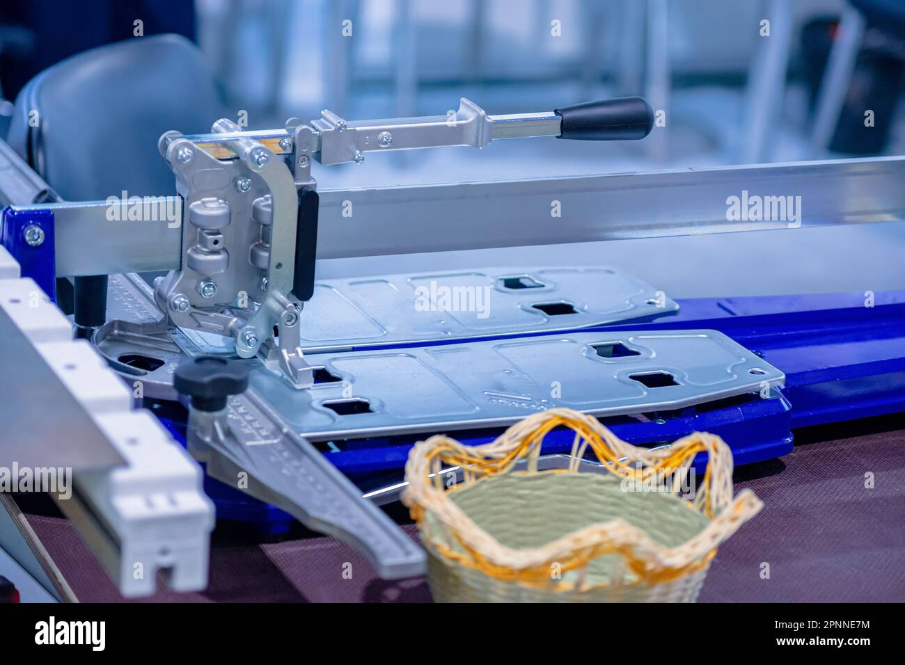 Tile cutter. Tool for the construction industry Stock Photo - Alamy