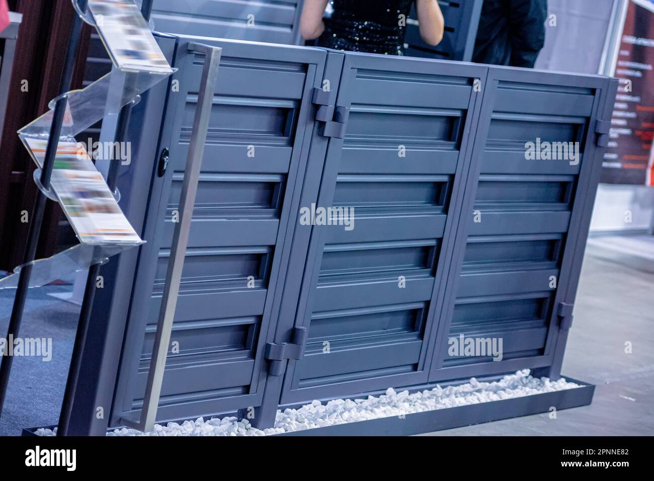 Metal fence shutters. Fencing element Stock Photo - Alamy