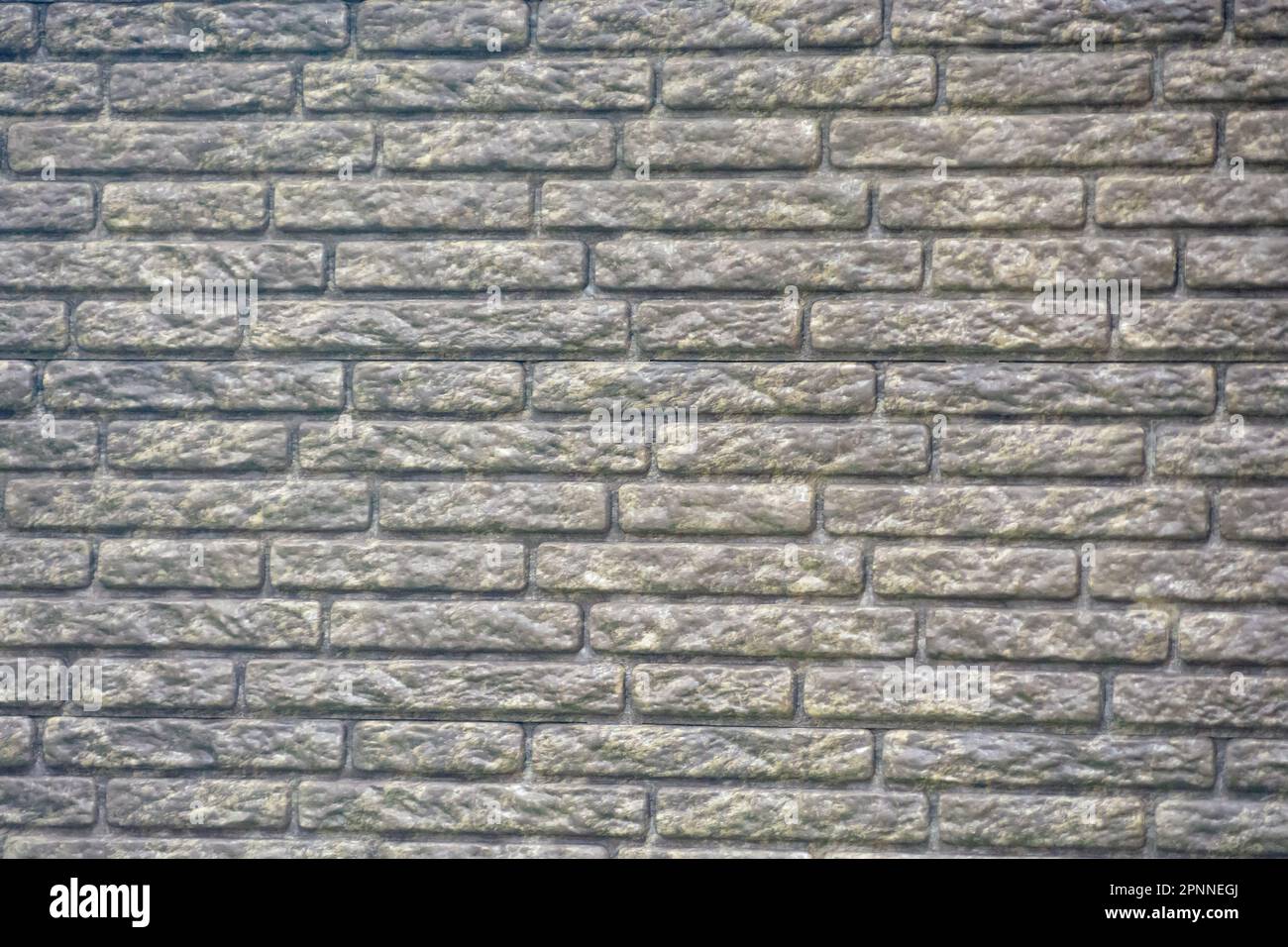 Gray brick decorative wall. Long and short narrow brick masonry Stock ...