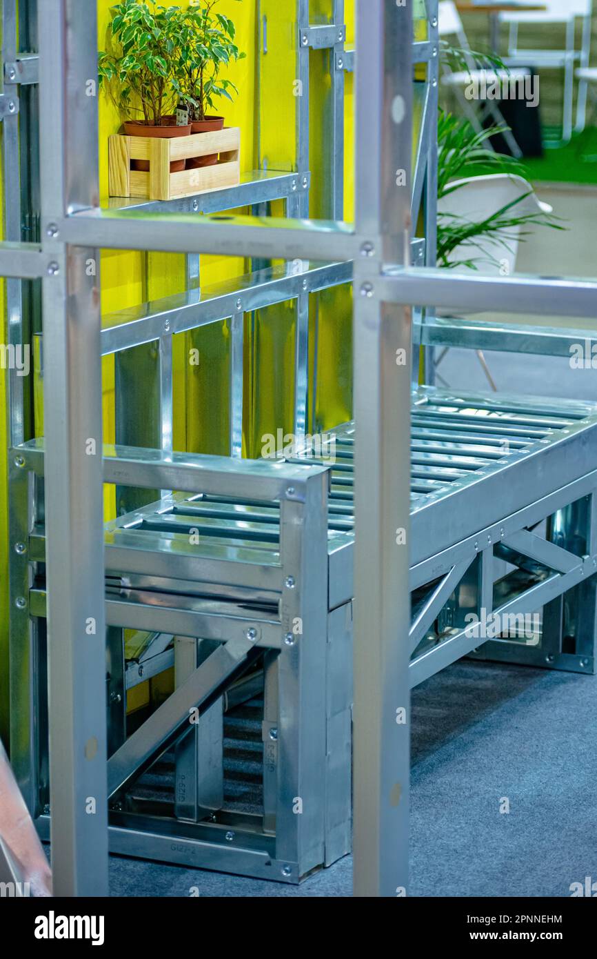 Metal profile furniture. Street bench Stock Photo - Alamy