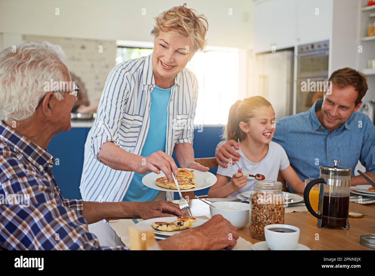 I made extra just for you. a multi generational family enjoying ...