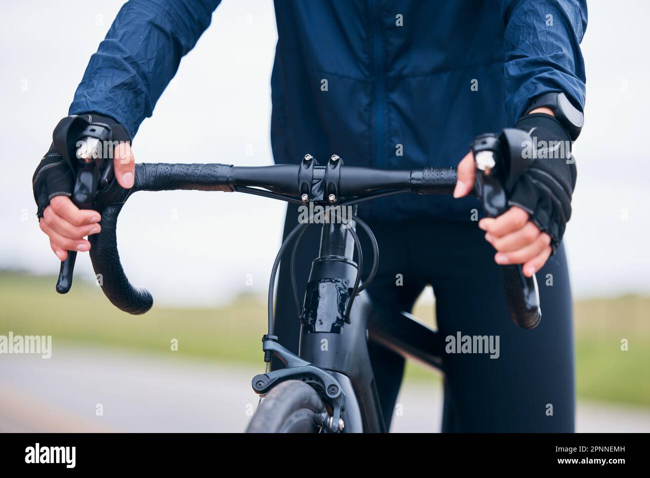 Hands holding handlebar bicycle hi-res stock photography and images - Alamy