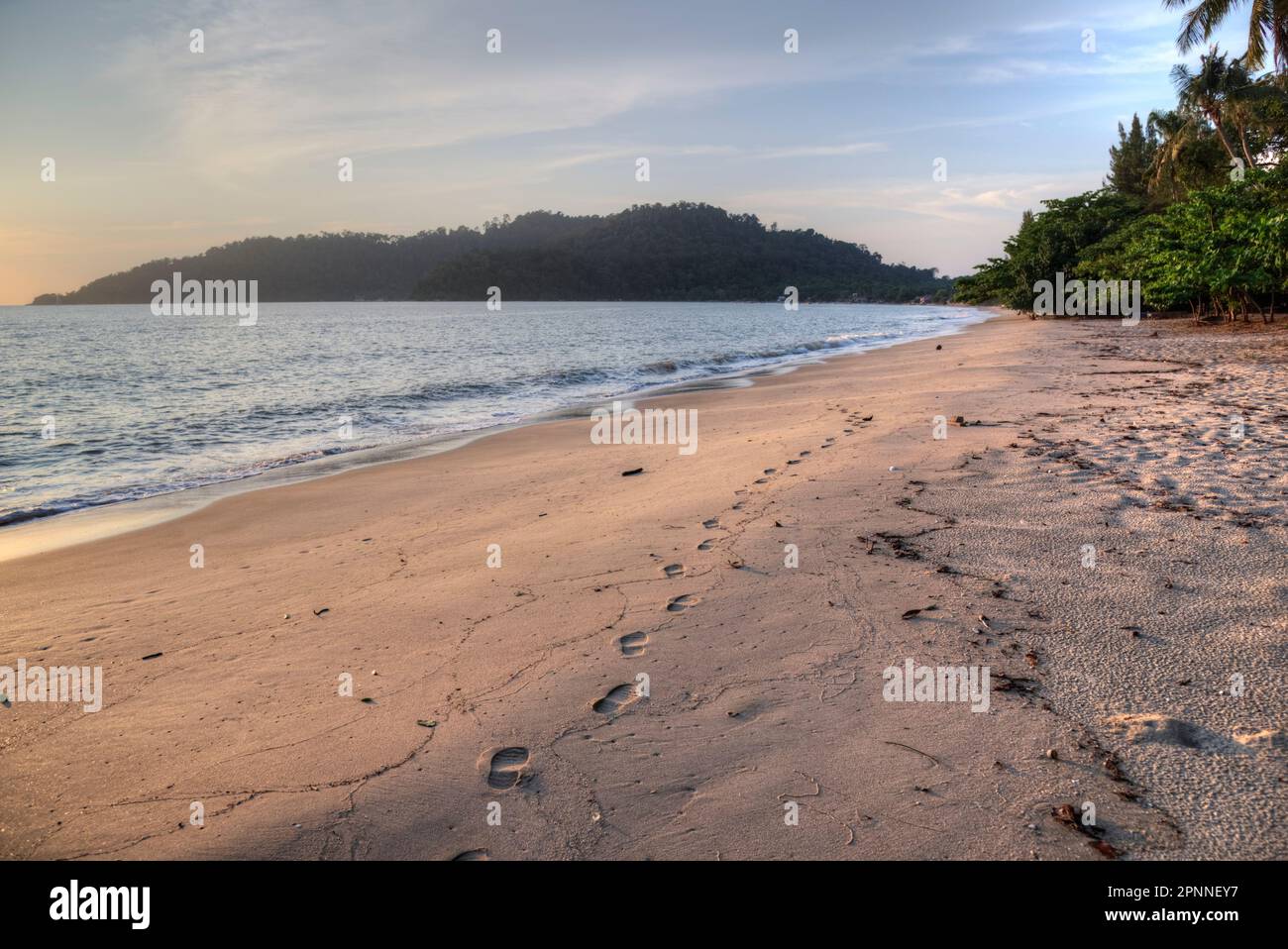 quiet peaceful scene at the sandy beach Stock Photo - Alamy