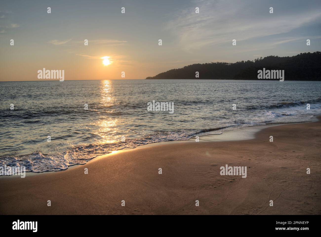 quiet peaceful scene at the sandy beach Stock Photo - Alamy