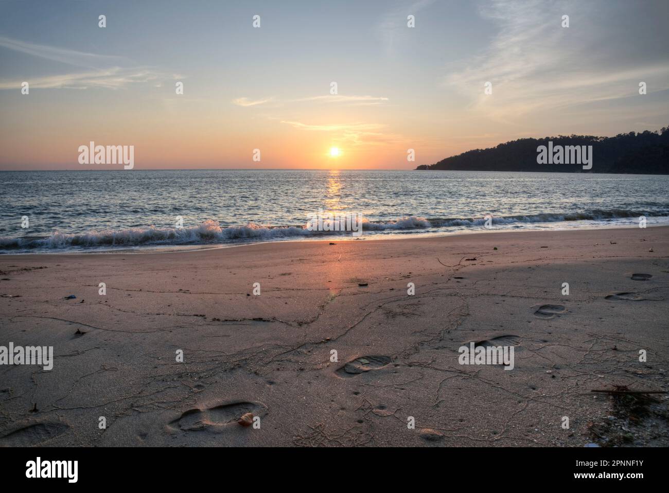 quiet peaceful scene at the sandy beach Stock Photo - Alamy