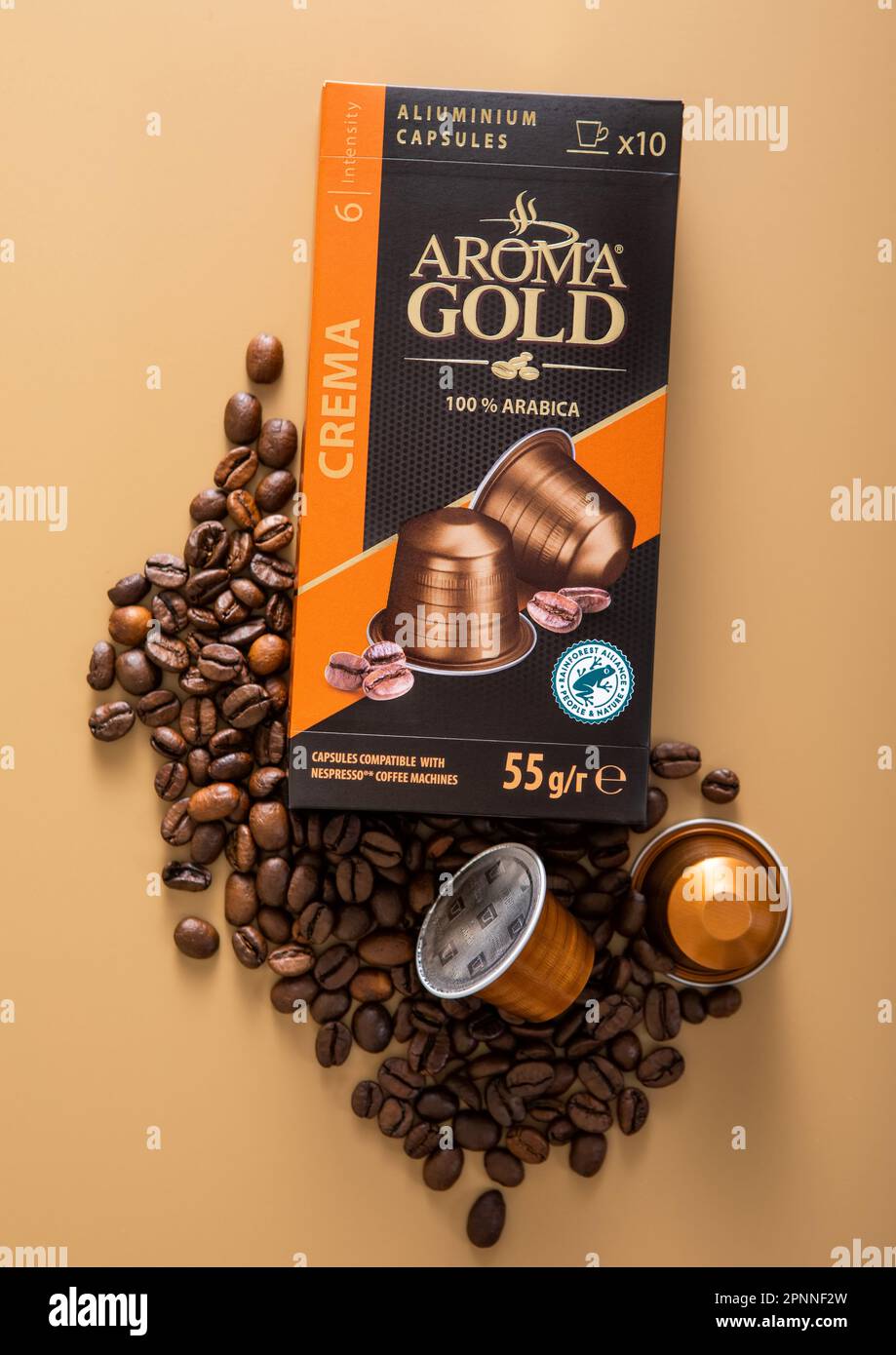 LONDON, UK - DECEMBER 20, 2022: Aroma Gold arabica aluminium capsules for coffee machine with ...