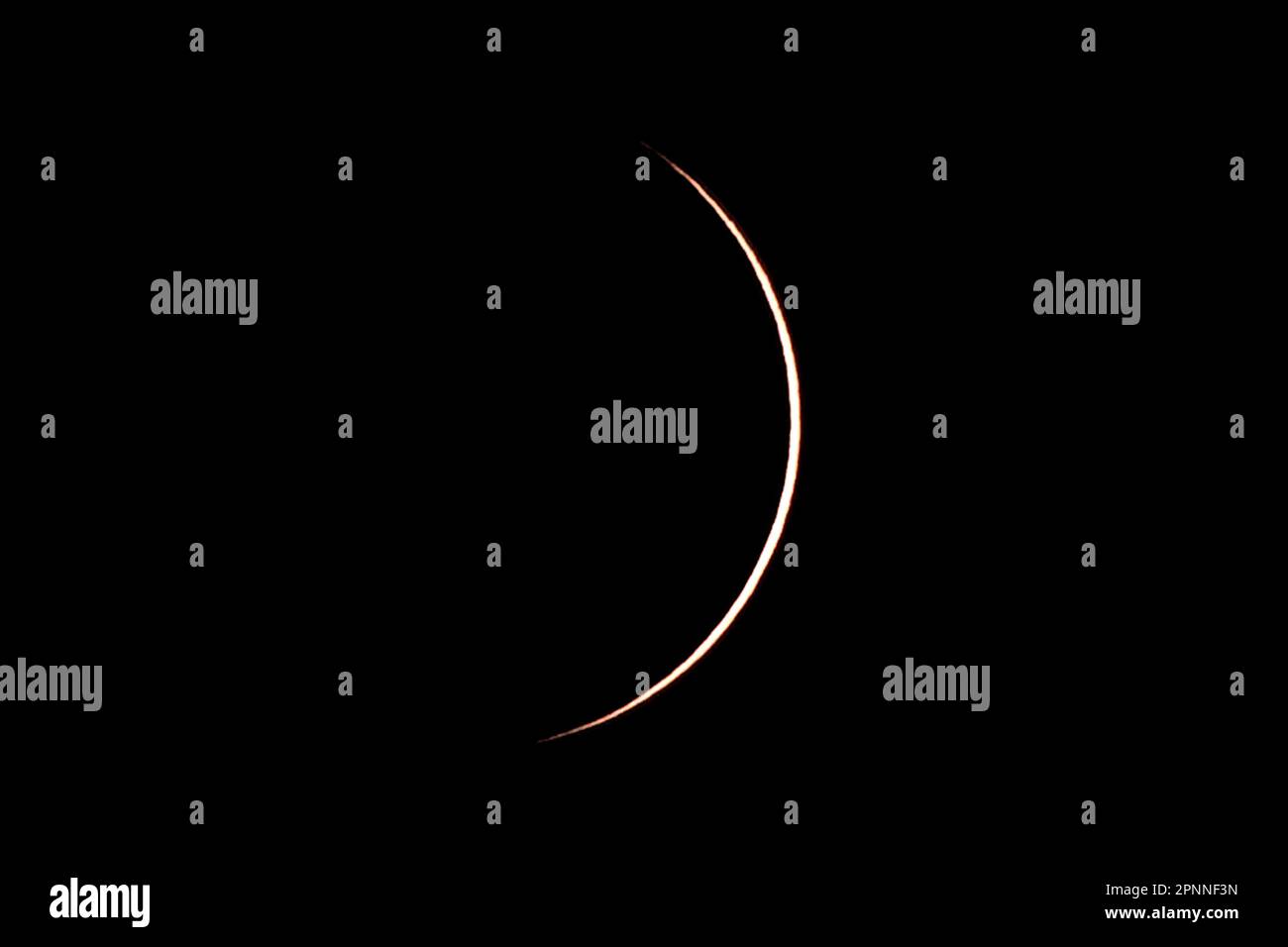A hybrid solar eclipse in seen from Lautem, East Timor, Thursday, April ...
