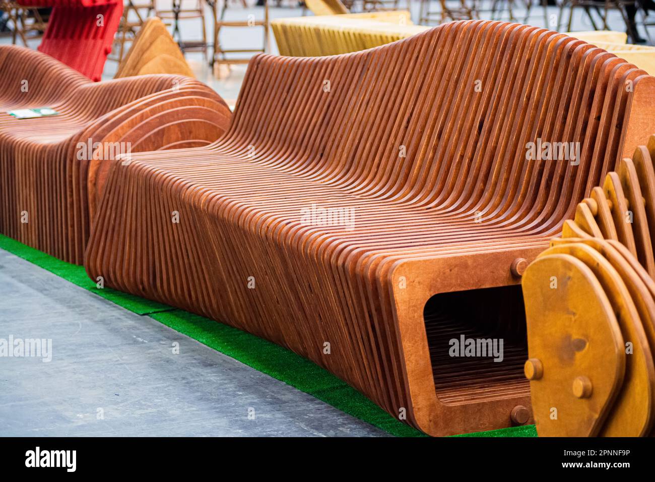 Wooden parametric furniture. Parametric bench sofa Stock Photo - Alamy