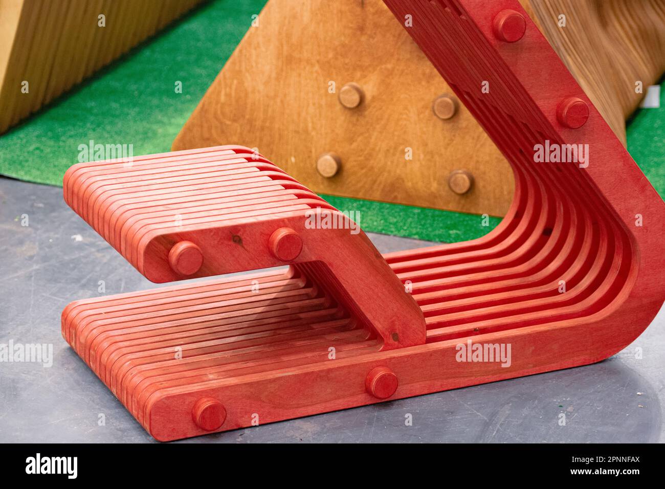 Wooden parametric furniture. Parametric bench sofa Stock Photo - Alamy