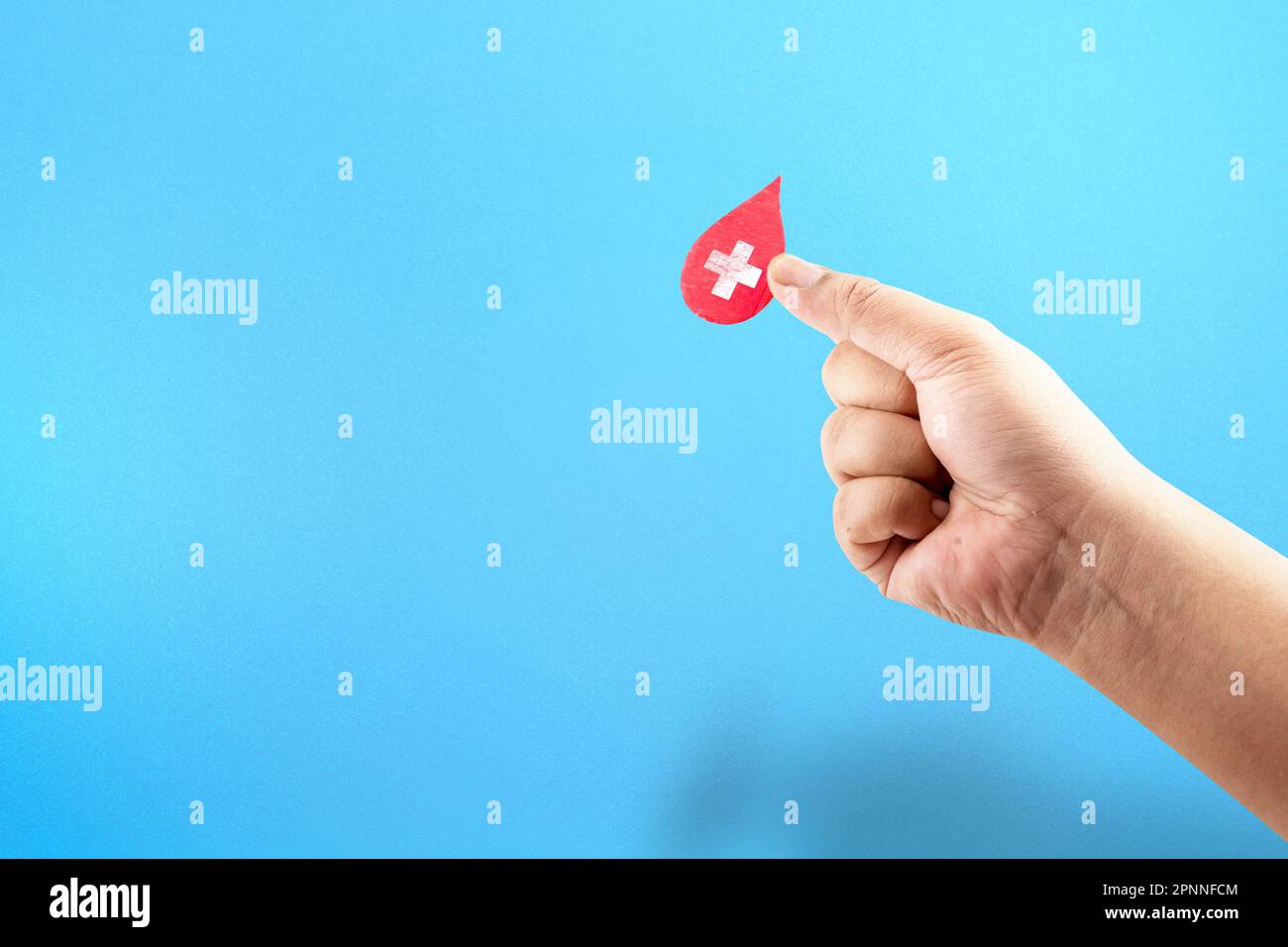 Human hand showing red blood drop. World blood donor day concept Stock ...