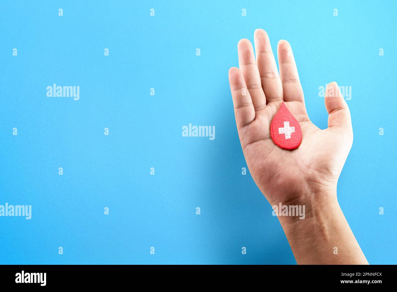 Human hand showing red blood drop. World blood donor day concept Stock ...