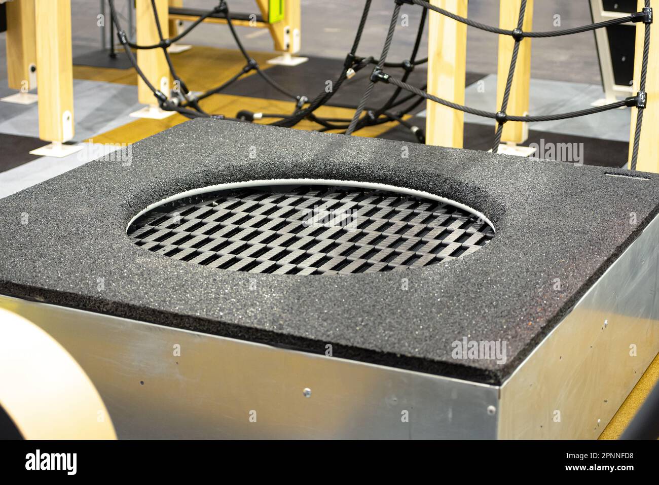 Small trampoline in the playground Stock Photo - Alamy