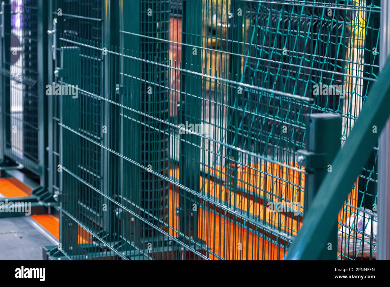 Green steel bar fence. Modern fencing systems Stock Photo - Alamy