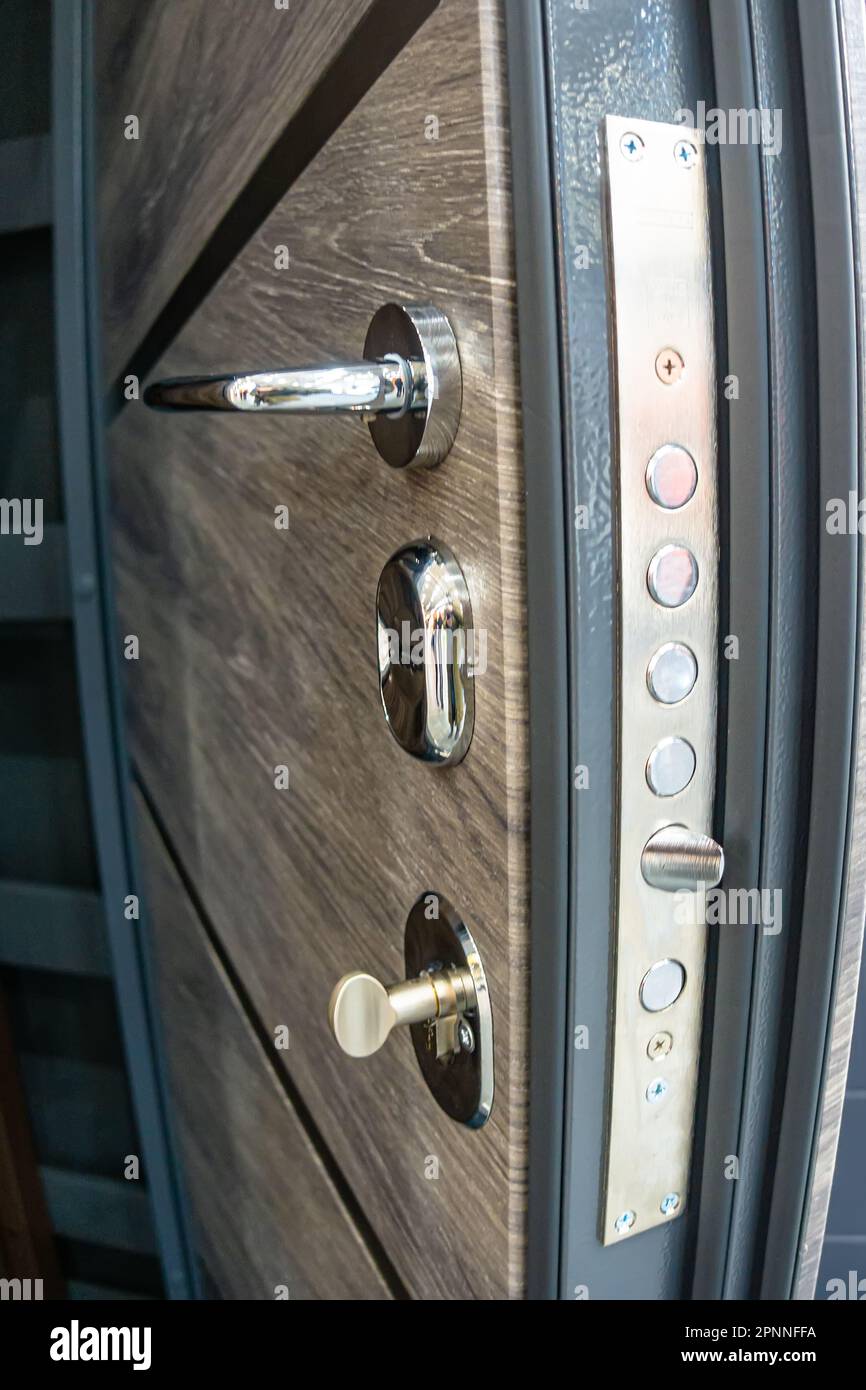 Strong inner lock in an iron door Stock Photo - Alamy